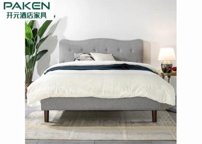 China Tufted Upholstered Platform Hotel Bed with Buckle Headboard 1800x2000mm Solid Wood Legs for sale