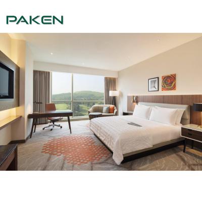 China Luxury Hotel Bedroom Furniture Set with 3000mm Headboard and 1800x2000mm King Bed for Marriott Standards for sale