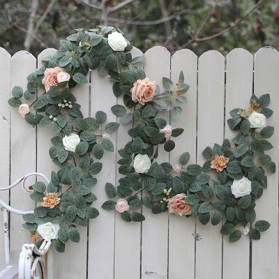 China Plastic Fake Wedding Flowers Rose Eucalyptus Vines Bulk for sale