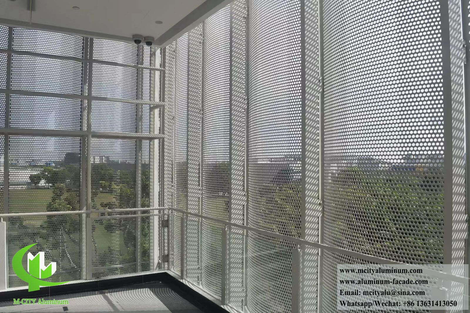 Bespoke aluminum wall cladding featuring a professional hook-on installation system for seamless facade alignment.