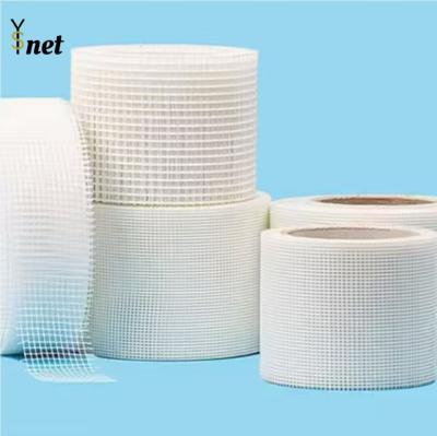 China Excellent Tensile Strength and low prices Wall Crack Repair 5cm*90m Self adhesive fiberglass mesh tapes drywall joint tape fiberglass mesh for plaster for sale
