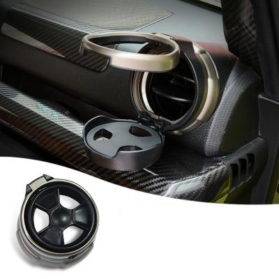 China ABS Plastic Cup Holder for Suzuki JIMNY JB74 JB64 Car Dashboard Air Outlet Fold Water Cup Bracket Storage Interior Supplies for sale