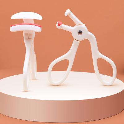 China Eyelash Curler Partial Plastic Construction With Silicone Replacement Pad for sale