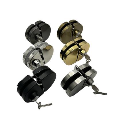 China Modern Double Sided Sliding Frameless Glass Door Hardware with Swing Center Lock Half-Round Stainless Steel Glass Lock with Keys for sale
