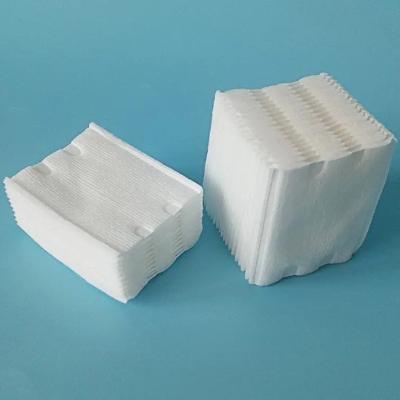 China 100% Cotton Nonwoven Cosmetic Cotton Pads 5x6cm Square - Medical Grade, Water Soluble, Lint Free for sale