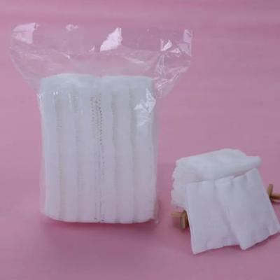 China Custom 5x6cm 100% Cotton Cosmetic Pads with Logo Printing - Mesh Nonwoven Material for Medical & Beauty Use for sale