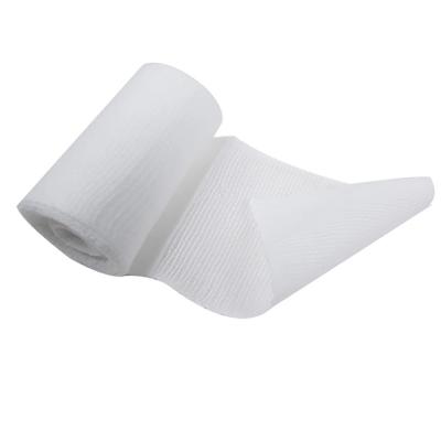 China 10cm x 4.5m Nonwoven PBT Conforming First Aid Bandage - Self-Adhesive Medical Dressing with Light Compression for sale