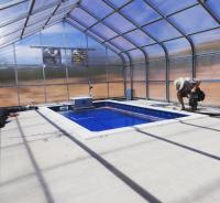 China Multi-Span Commercial Greenhouse with End Floral Sightseeing and Striped Glass Terrace for sale