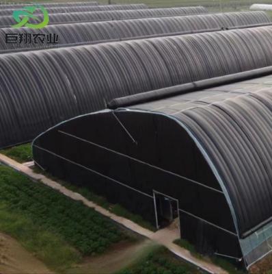 China Commercial Greenhouse Double Arch Beam Greenhouses with Snow Vibrator in US Currency for sale