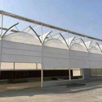 China Modern Sunlight Glass Greenhouse with Automatic Irrigation System for sale