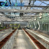 China Ju Xiang Glass Greenhouse with Type Roof Shipping Cost and Estimated Delivery Time for sale