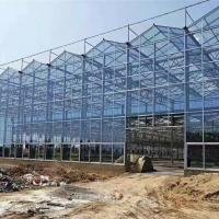 China Ju Xiang Glass Greenhouse with Type Roof Shipping Cost and Estimated Delivery Time for sale