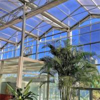 China US 20/Square Meter Ju Xiang Glass Greenhouse for Cultivating Vegetables Full Payment for sale