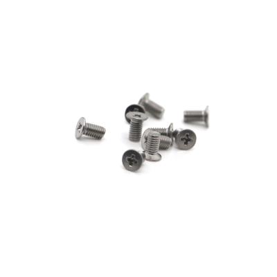 China Precision Micro Screw Flat Head Cross Recessed Machine Screw Carbon Steel M0.5 M3.0 for sale