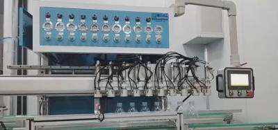 China 10000bph Moving Type Bottle Leak Tester 10 Workstations Empty Bottle Leak Testing Machine for sale