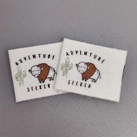 China Custom Embroidered Cotton Clothing Labels for Baby Garments - 1000pcs MOQ with 6 Folding Styles for sale