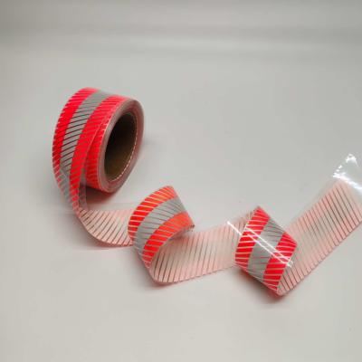 China Twill Stripes Red Silver Reflective Heat Transfer Film Self Adhesive 300-480cdluxm2 for Workwear Garments for sale