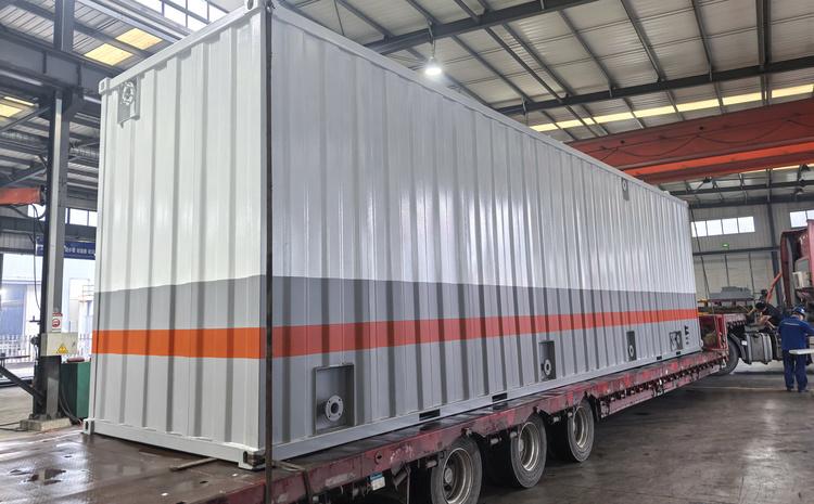 Containerized wastewater treatment system secured for delivery
