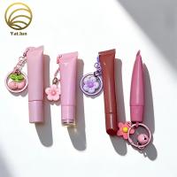 China 10ml 20g empty round plastic PE tube with hang charm screw cap for sale