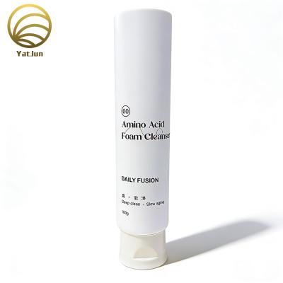 China 100g PE empty plastic tube packaging with flip top cap for facial cleanser for sale