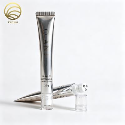 China 25g PE Cosmetic Squeeze Tube with 3 Roller Balls Massage Applicator for Eye Cream Packaging for sale