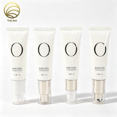 China 30g PE Cosmetic Squeeze Tube with Pump Dispenser for Lotion Packaging for sale