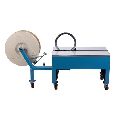 China MH-TDML-00 Semi-Automatic Strapping Machine 3 Second Cycle PP Belt 450mm Table Height for sale