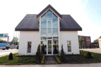 China ISO 9001 Certified Prefab Steel Villa with 8 Grade Anti-Earthquake Capacity and 50mm Insulation Panels for sale