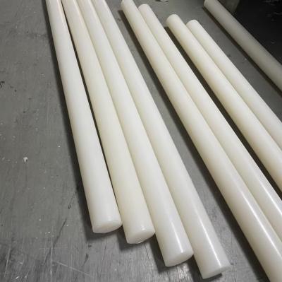 China 50 KJ/M2 Impact Strength Nylon Plastic Rod with 80°C Heat Deflection Temperature and 2.5%-2.8% Moulding Shrinkage for Industrial Applications for sale