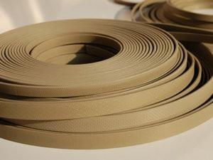 China Brown PTFE Guide Stripe Tape (GST) with 60%PTFE+40%bronze for High Wearing Resistance and 15m/s Working Speed for sale