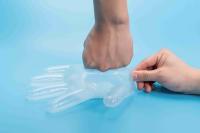 China Food-Contact Directly Disposable Use PE Gloves Waterproof Free Size Plastic Gloves for sale
