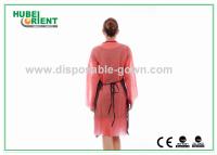 China Thin Neck Tie 40gsm Nonwoven Disposable Aprons for sale