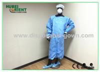 China Blood Proof Blue Disposable Dental Gowns/Tyvek Protective Clothing with knitted wrist for sale