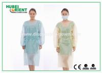 China Medical Protective Clothing / Blue Yellow Surgical PP+PE Isolation Gown With Elastic Wrist For Clinic for sale