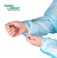 China Blue/White Waterproof Disposable PP PE Medical Isolation Gown With Blue Tape for sale