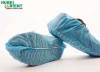 China OEM Disposable 35gsm Nonwoven Shoe Cover With Non Slip Stripes Sole for sale