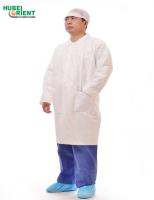 China Tyvek Lab Coat Non Woven Disposable Lab Coat Hospital Nursing Disposable Gown for sale