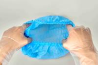 China 25gsm Non-Woven Double Elastic Disposable Round Head Cap Medical Doctor/Nurse Cap for sale