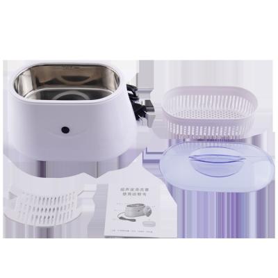 China 35W Portable Ultrasonic Cleaner with 650mL Capacity and 40kHz Frequency for Household and Professional Use for sale