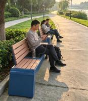 China Ergonomic Backrest Solar Powered Benches Wireless Charging Smart Park Benches USB Charging for sale