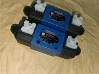 China R900592338 4WE10J3X/CW110N9K4 4WE10J33/CW110N9K4 Rexroth Directional Spool Valve for sale