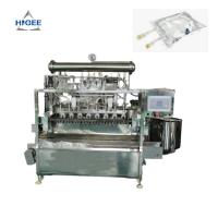 China Higee machinery iv bag filling and sealing machine with sticker labeling machine for sale
