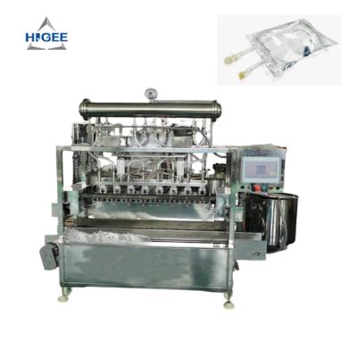 China Higee machinery iv bag filling and sealing machine with sticker labeling machine for sale