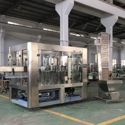 China Soft Drink Automatic Water Filling Machine Gravity Filling For PET Plastic Bottle for sale