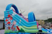 China Animated Comic Character Big Kids Ground Inflatable Dry Slide With Arch Door for sale