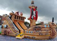 China PVC Commercial Grade Giant Pirate Ship Inflatable Dry Slide With Climbing Ladder for sale