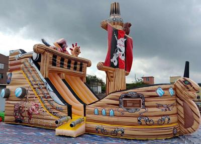China PVC Commercial Grade Giant Pirate Ship Inflatable Dry Slide With Climbing Ladder for sale