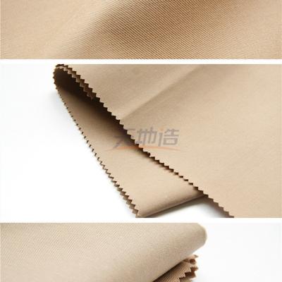 China 250gsm Khaki Dope Dyed Aramid Fabric Flame Resistant for Desert Uniforms 150cm Width for sale