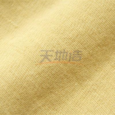 China 220gsm 100% Para Aramid Fabric Raw Yellow 1.6-1.8m Width for Anti-Cut Anti-Stab Protective Gloves for sale