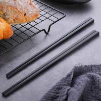 China Slub Pattern Smooth Black Alloy Chopsticks Non Slip For Home Restaurant for sale